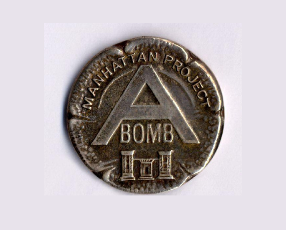 Manhattan Project Bomb Pin | International Spy Museum